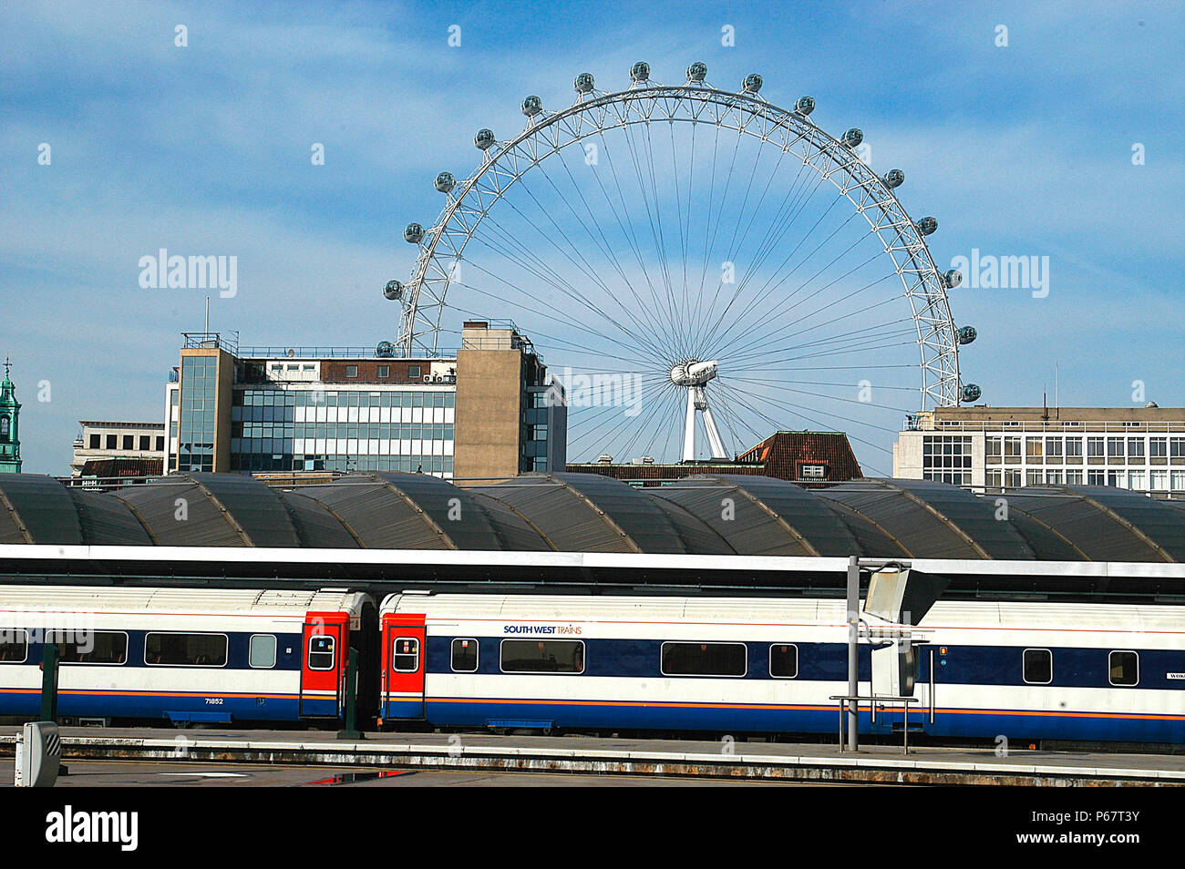 Platform scene at London Waterloo with a suburban service at the ...