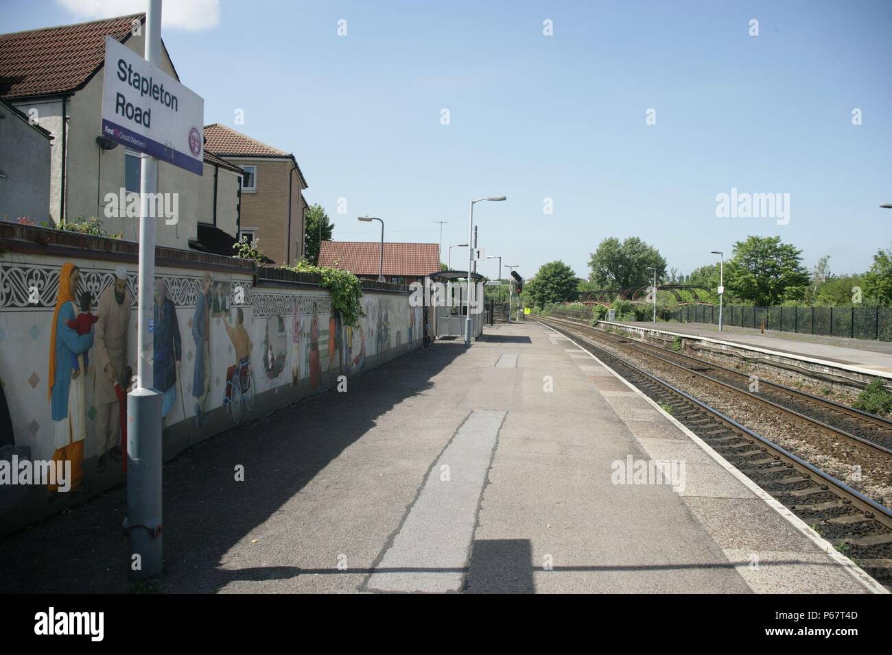 Platform view at Stapleton Road station near Bristol showing wall art ...