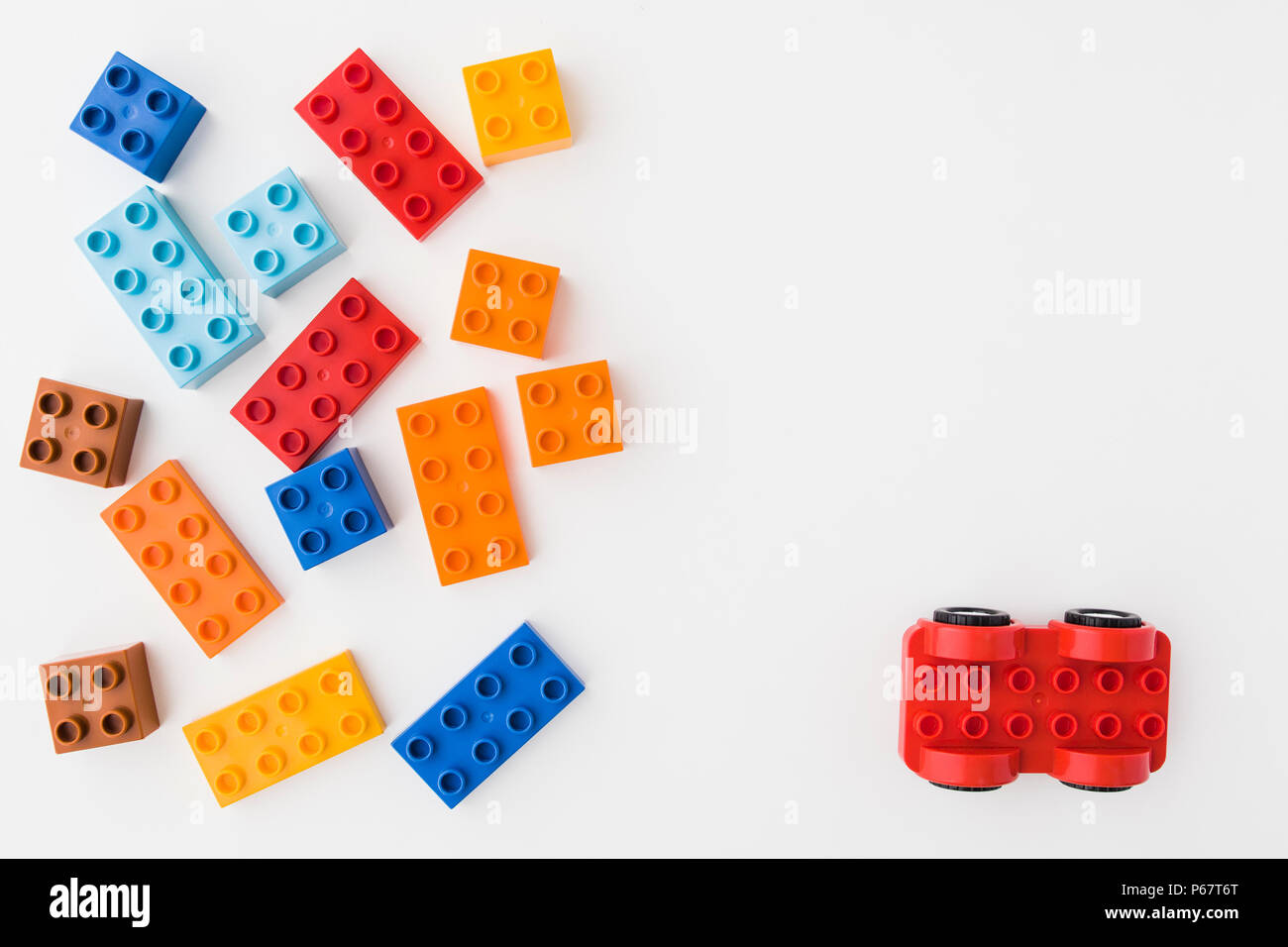 toy bricks of assorted colors on white background Stock Photo - Alamy