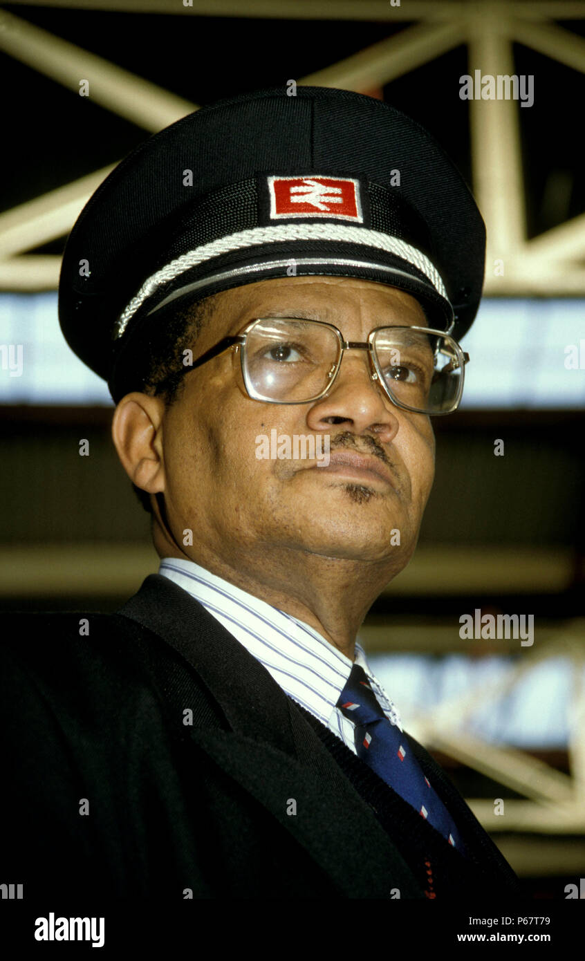 Railway member of staff in InterCity uniform. C1993 Stock Photo - Alamy