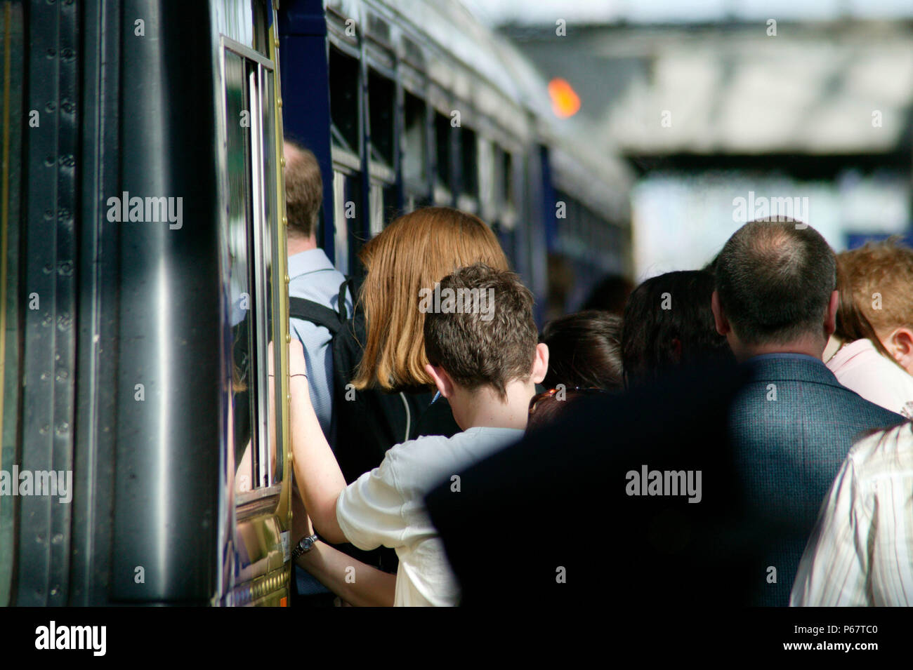 Crowded train boarding station hi-res stock photography and images - Alamy