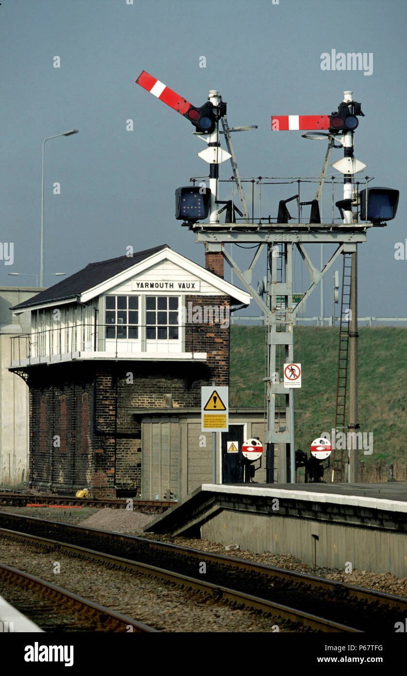 Semaphore signals and signal box at Yarmouth Vaux station. c 1993 Stock ...