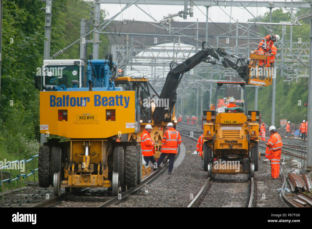 Set against a typical London and North Western Railway overbridge three ...