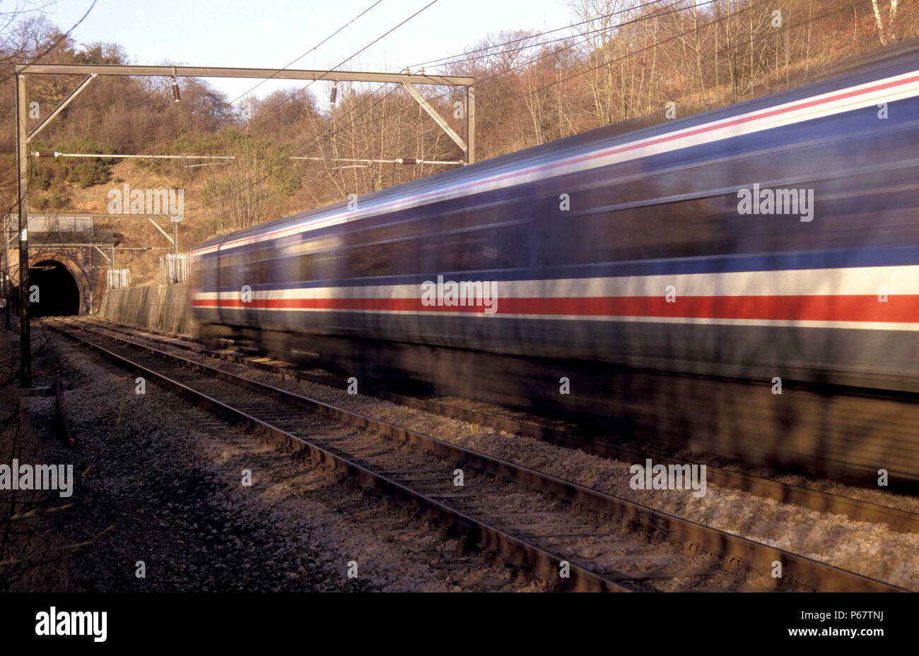 Train entering railway tunnel hi-res stock photography and images - Alamy