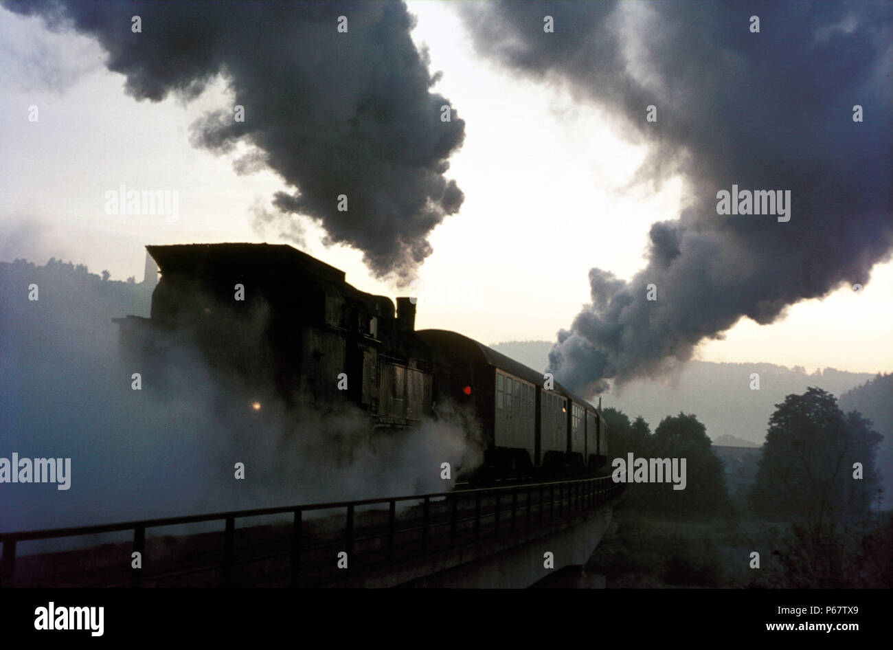 Sunrise in the Black Forest. A former Prussian P8 Class 4-6-0 heads ...