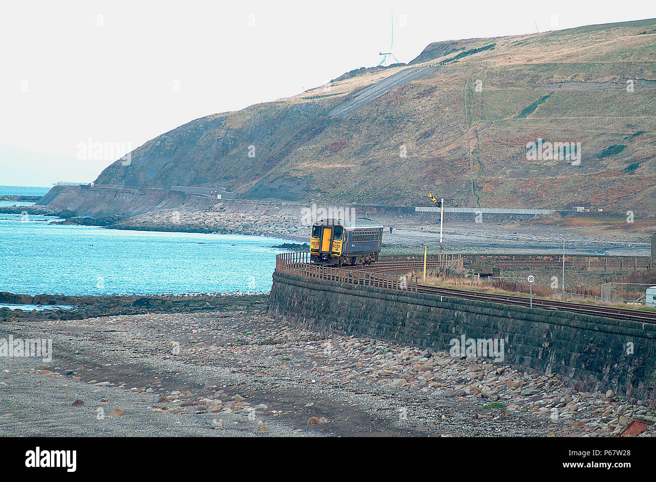 The barrenness of the Cumbrian Coast is well seen as a single Class 153 ...