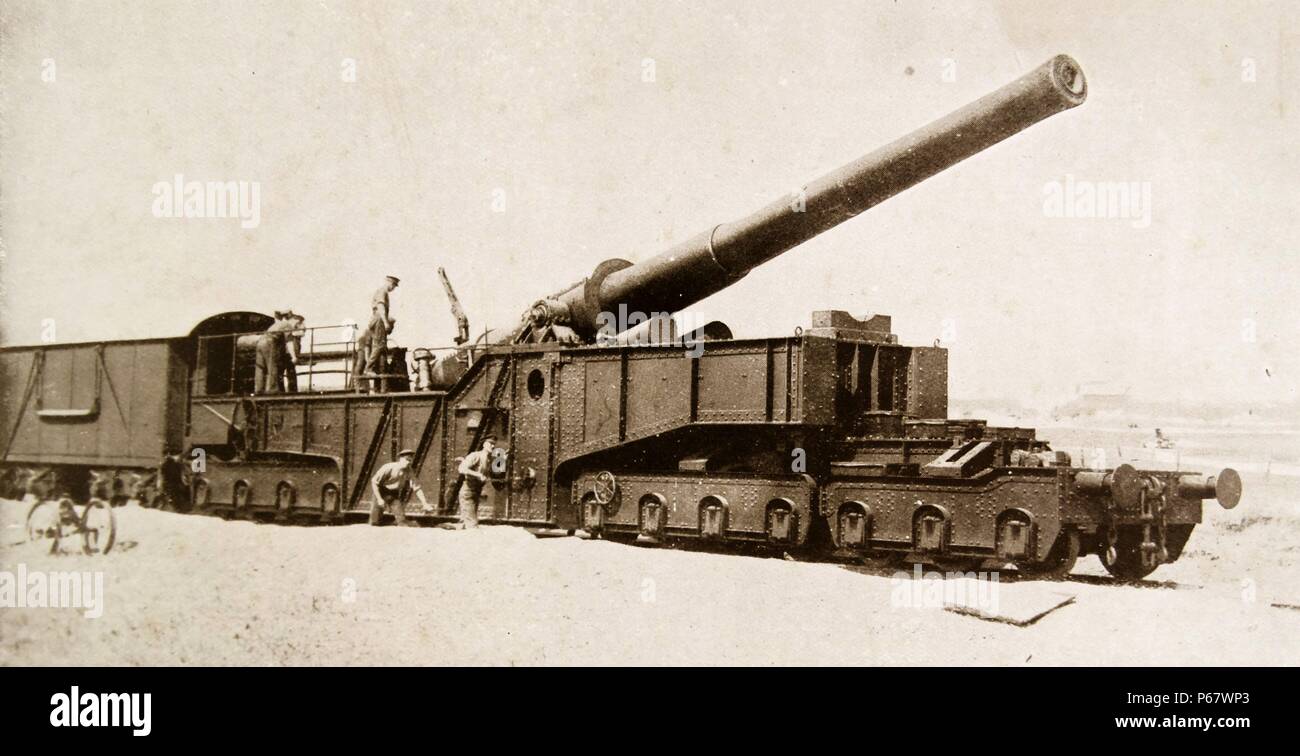 Large British artillery cannon mounted on a railway carriage for ...