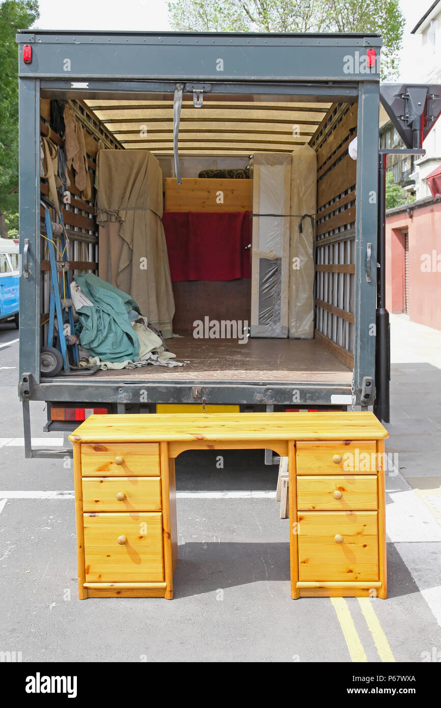 Open rear end of moving furniture truck Stock Photo - Alamy