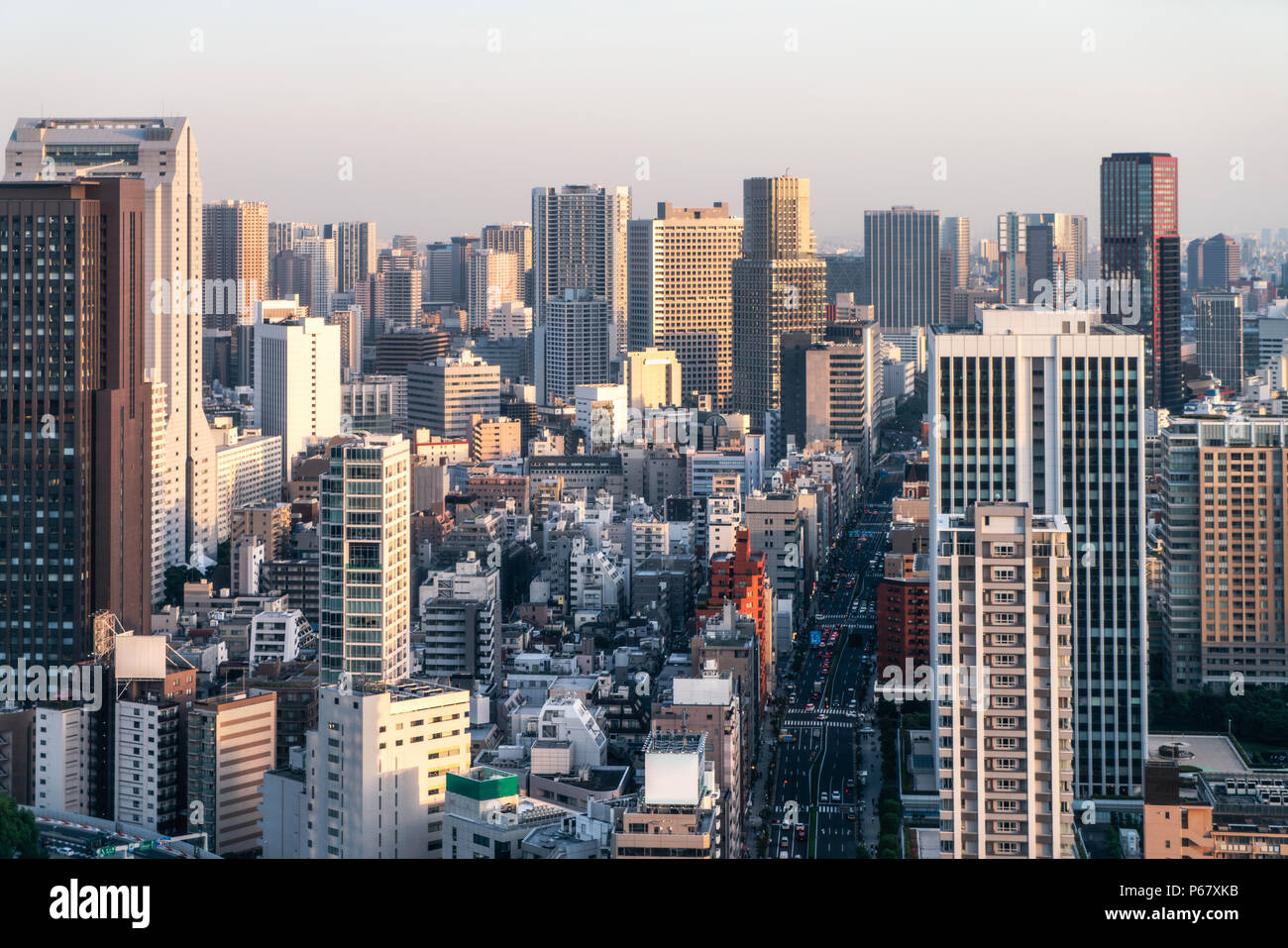 Densely built city skyline at sunset Stock Photo - Alamy