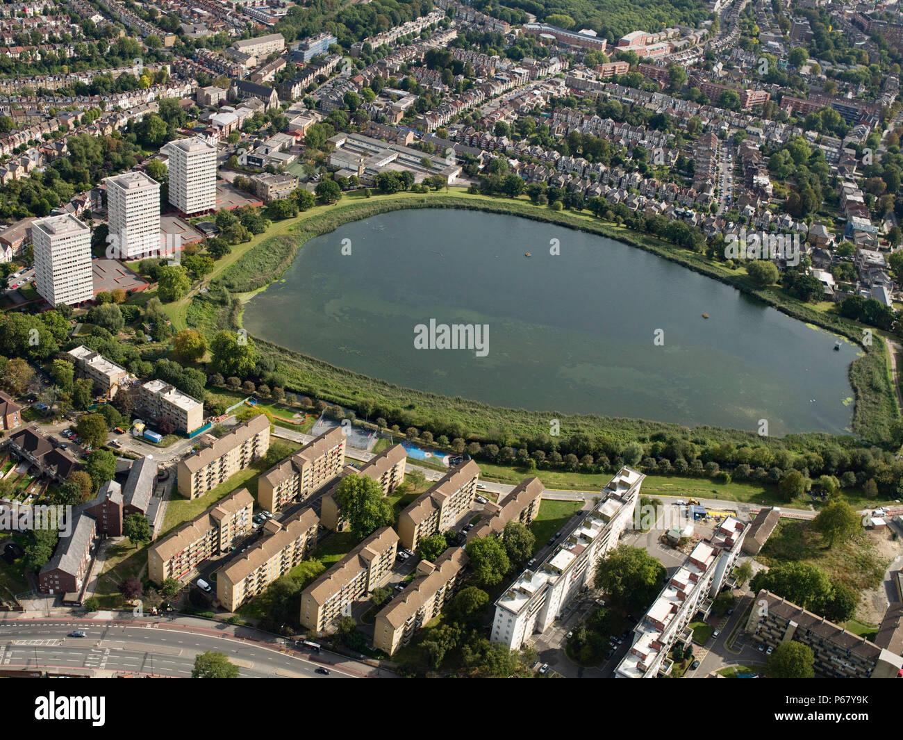 Aerial view North London reservoir and housing estates between ...