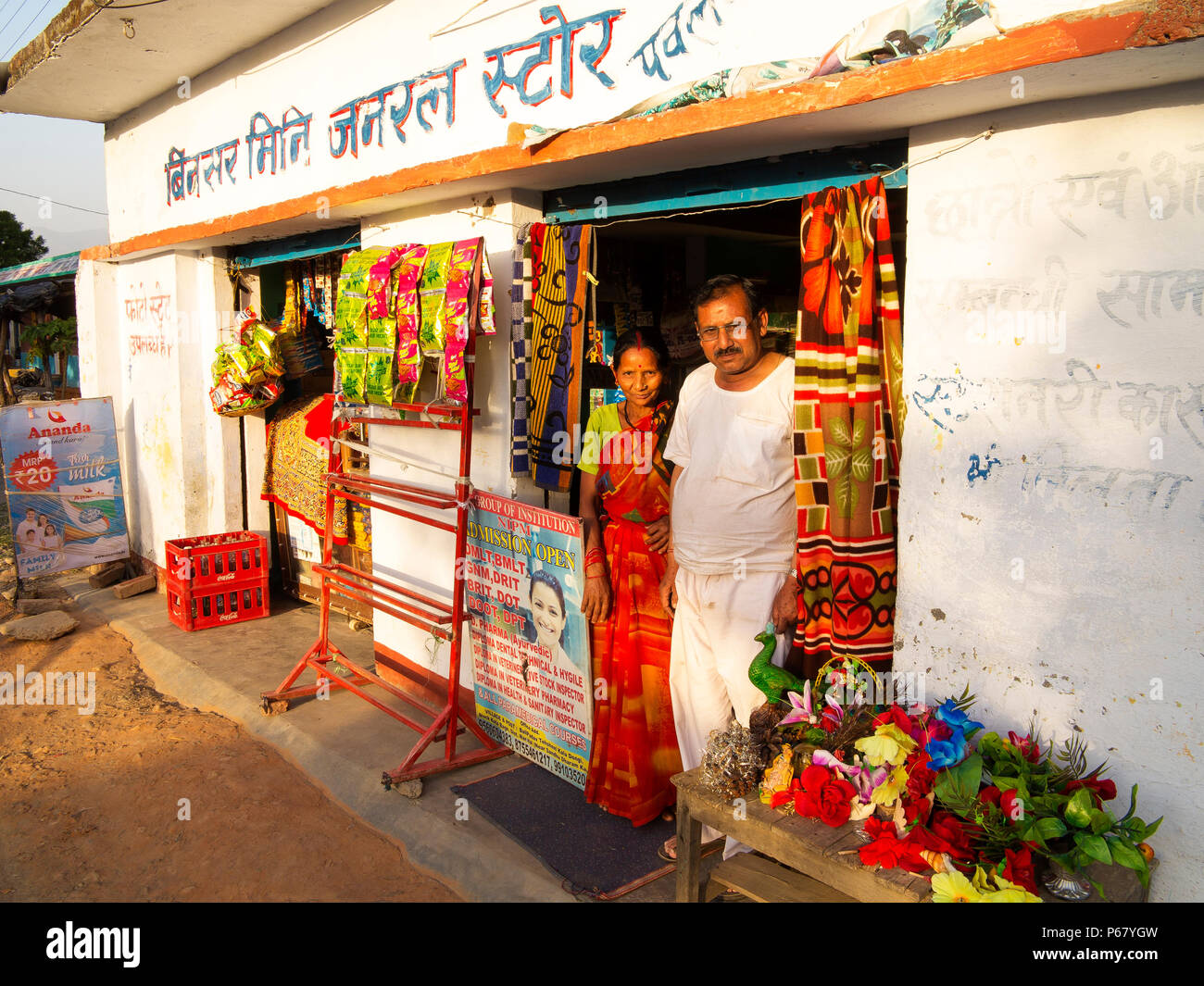 Indian couple, owners of a small shop at Pawalgarh, Uttarakhand, India ...