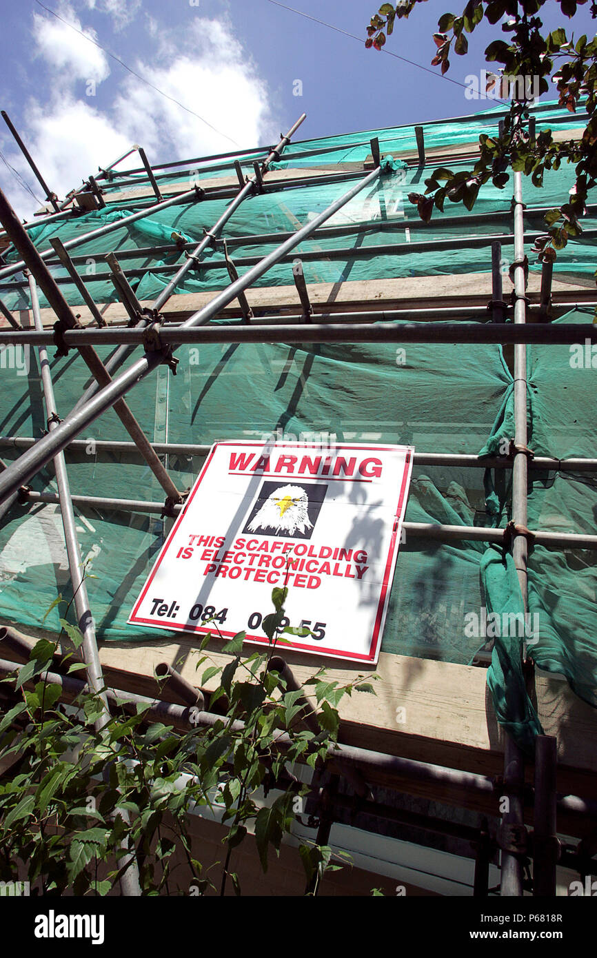 Security signs on a scaffolding Stock Photo - Alamy
