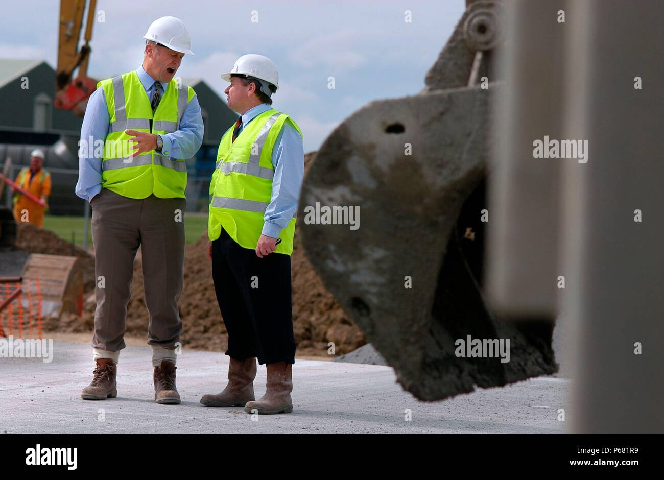 "Site workers on road construction site, London, UK Stock Photo - Alamy