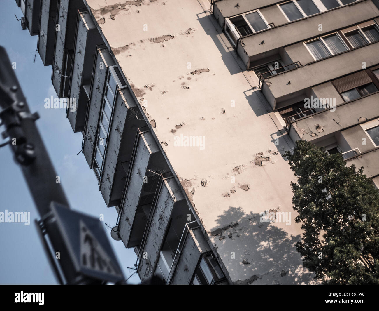 Decrepit urban high-rise apartment building located in the suburbs in ...