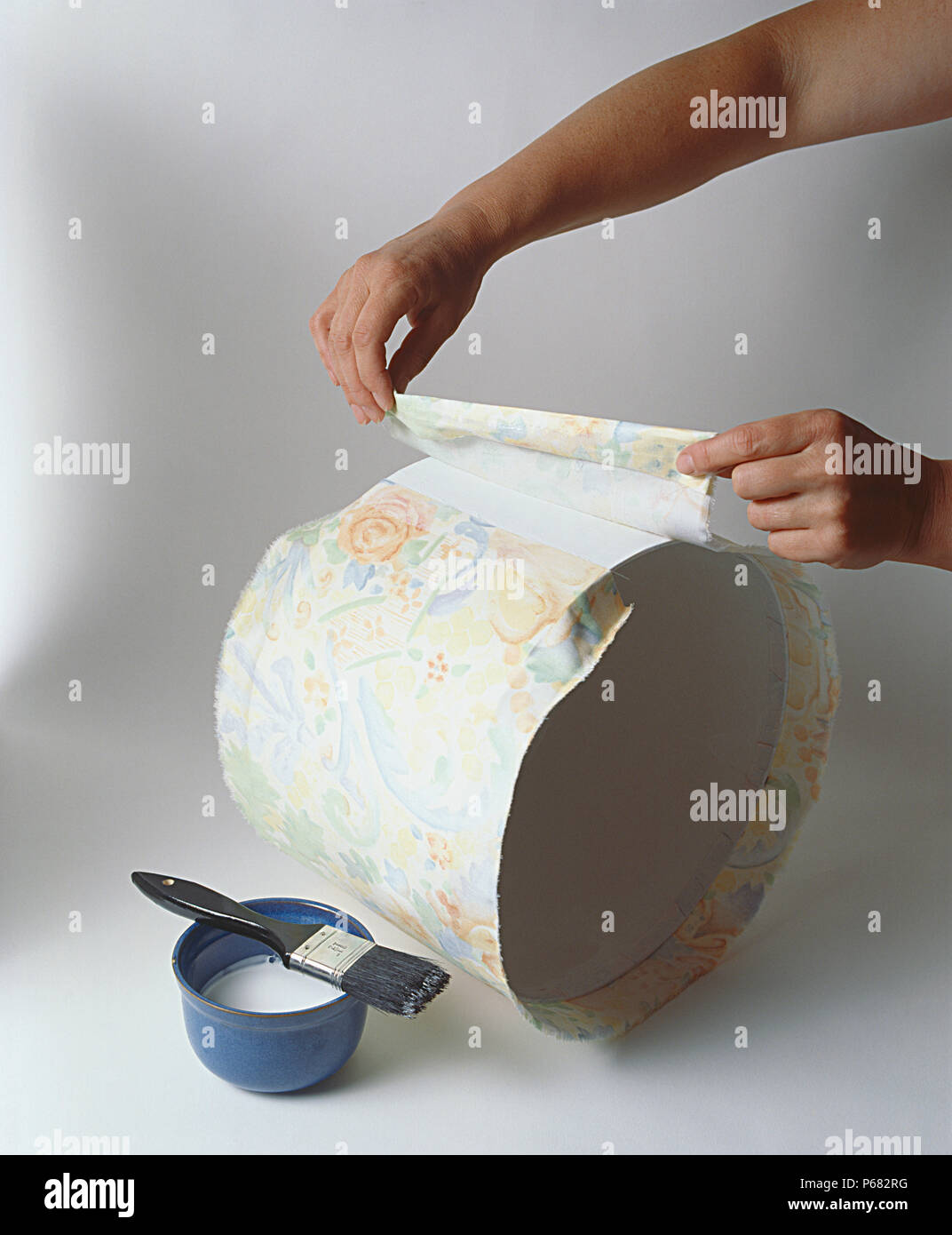 Covering a cardboard storage box Stock Photo - Alamy