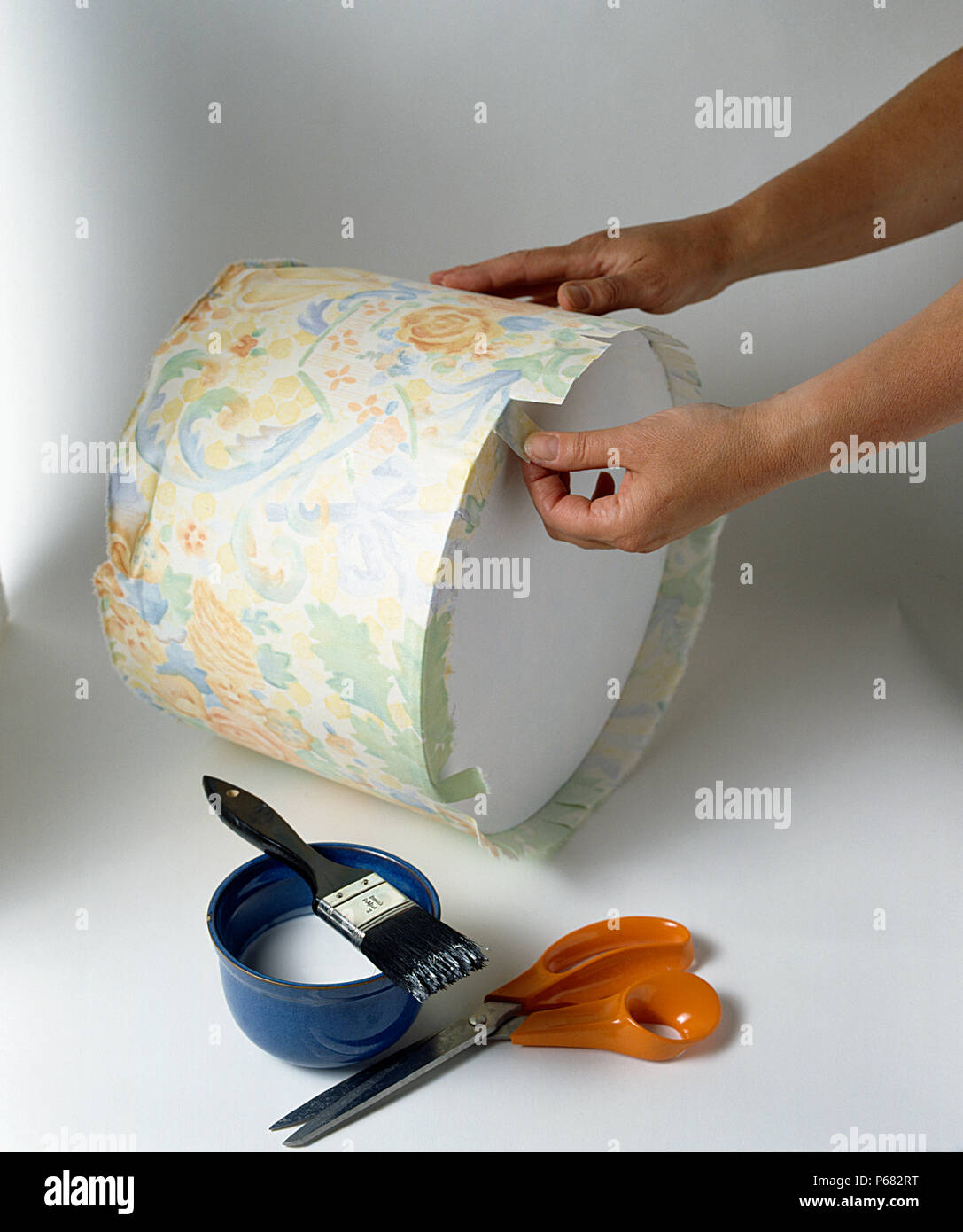 Covering a cardboard storage box Stock Photo - Alamy