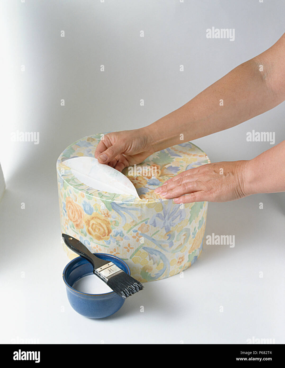 Covering a box hi-res stock photography and images - Alamy