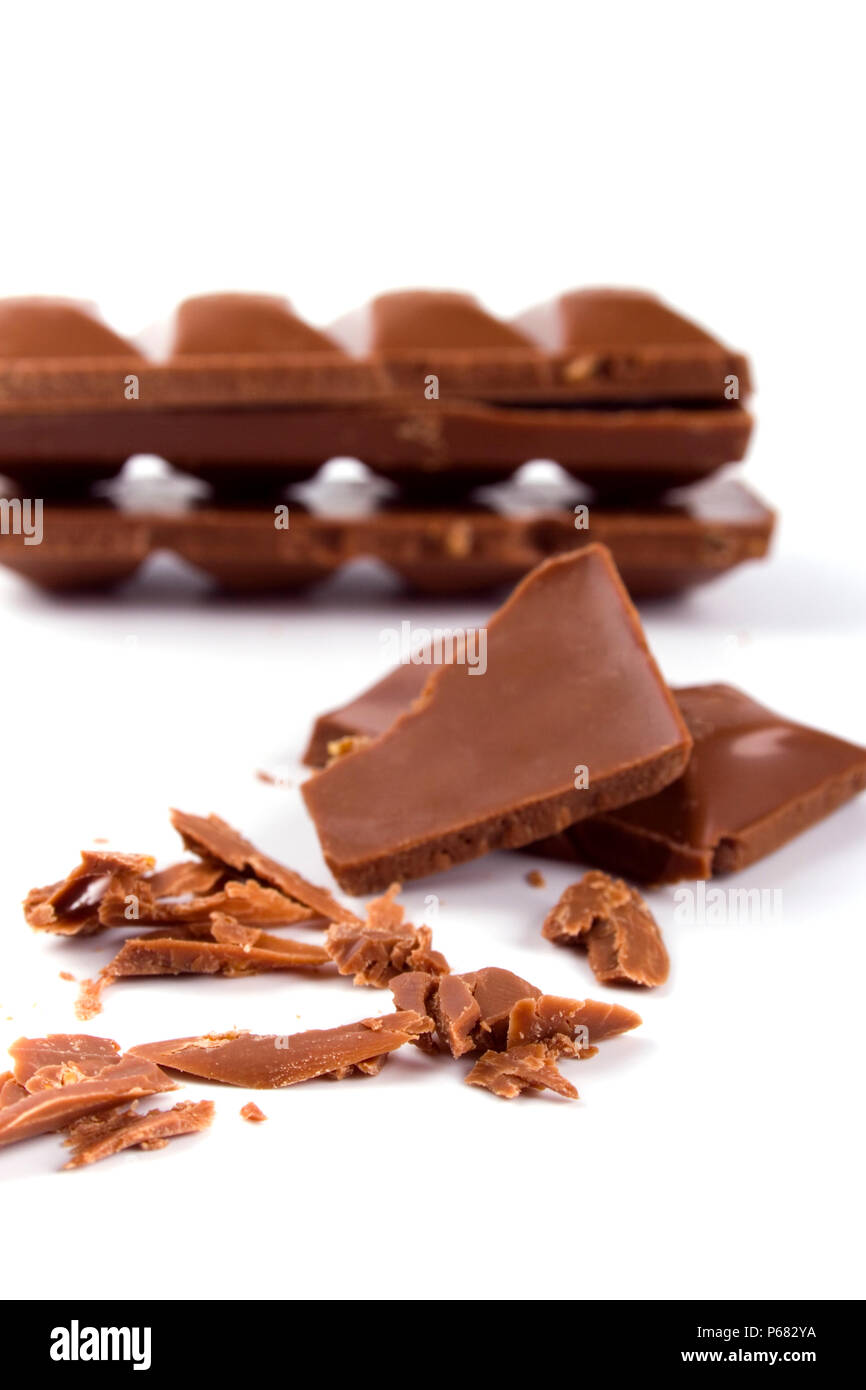 pile of broken milk chocolate blocks Stock Photo - Alamy
