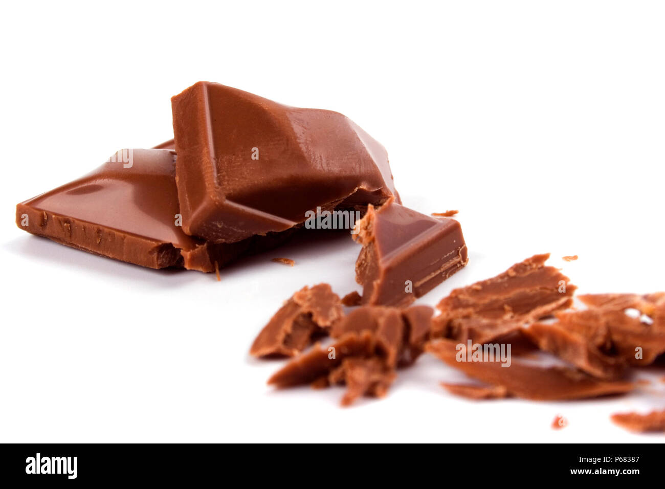 pile of broken milk chocolate blocks Stock Photo - Alamy