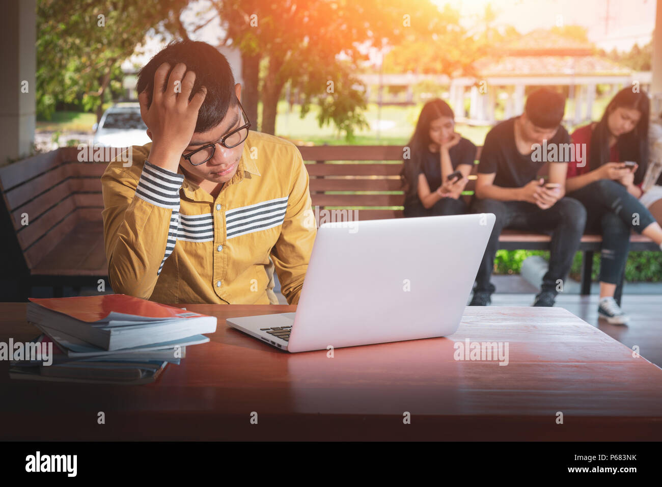 Man stressed while working on laptop, Young man feeling stressed ...