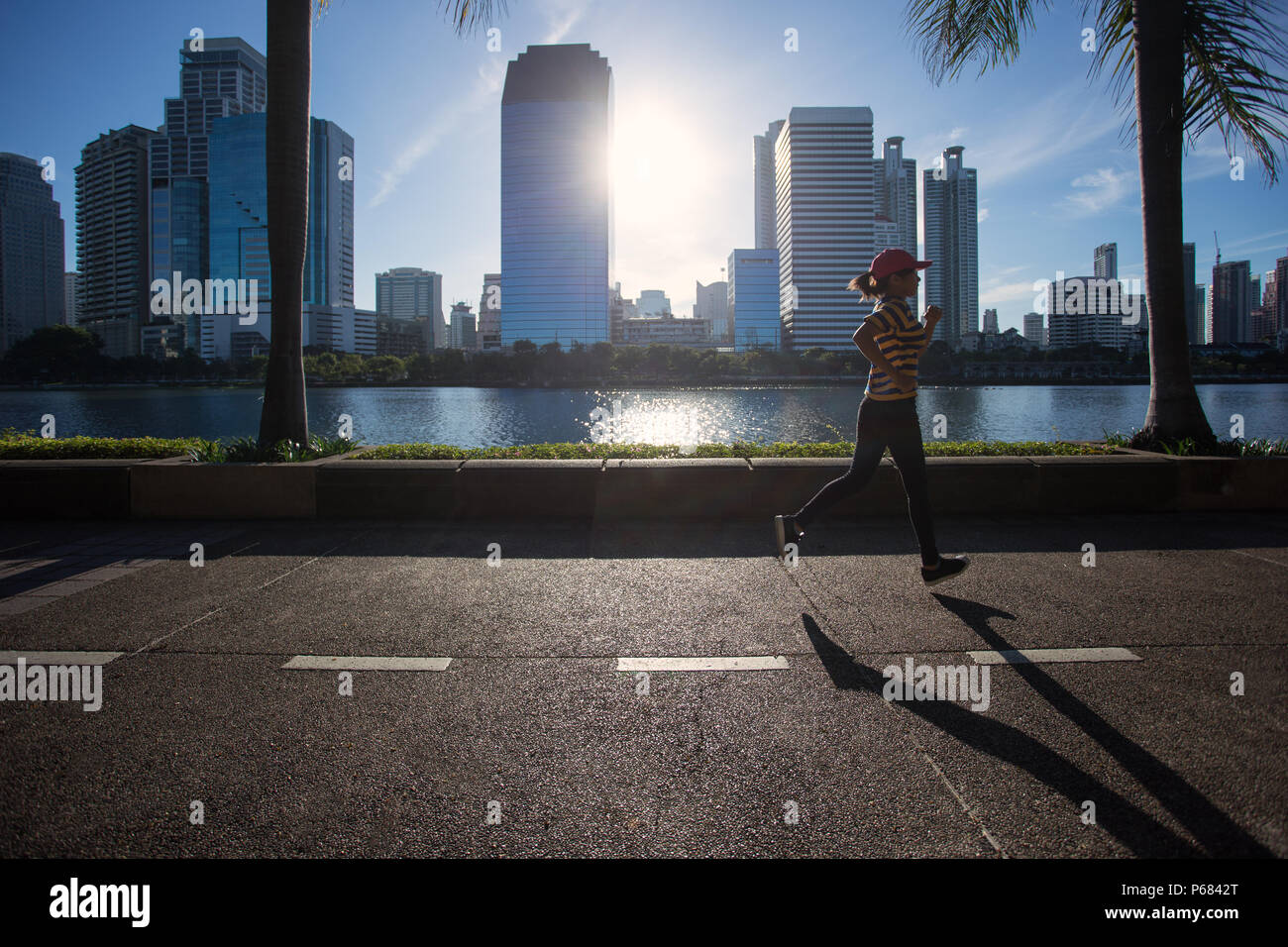 Athletic young man running in the nature. Healthy lifestyle Stock Photo ...