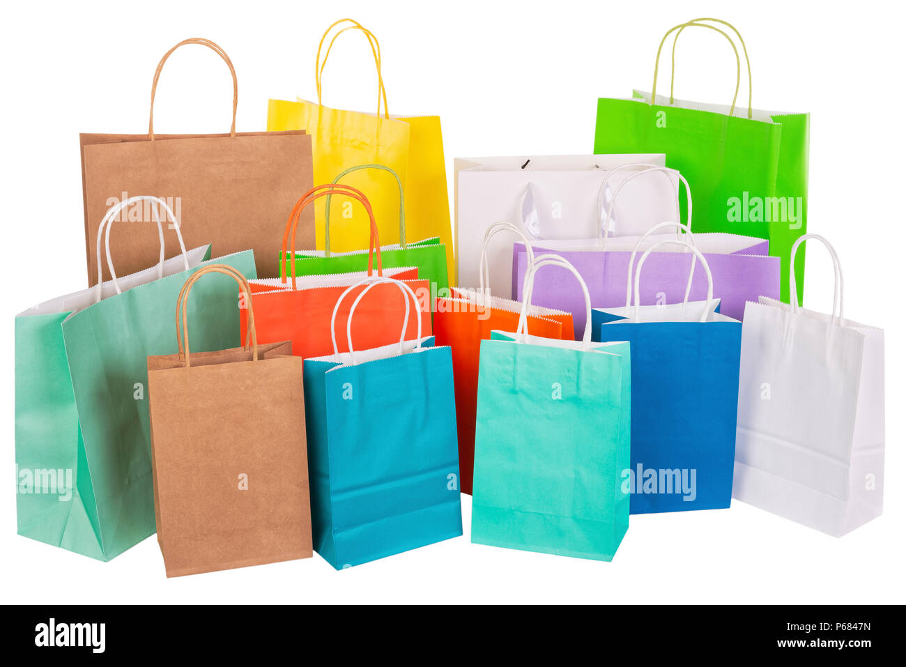 Variety of colored paper shopping bags on white background. Empty area ...