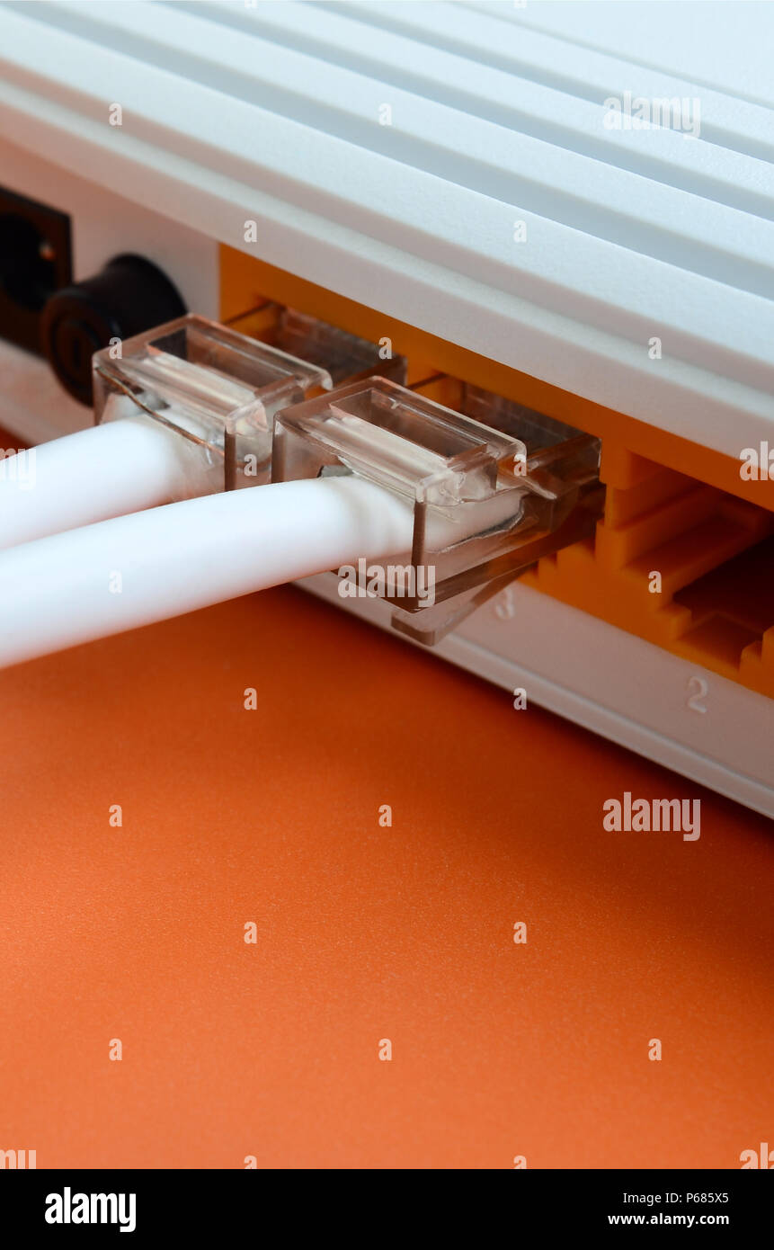 The Internet cable plugs are connected to the Internet router, which ...