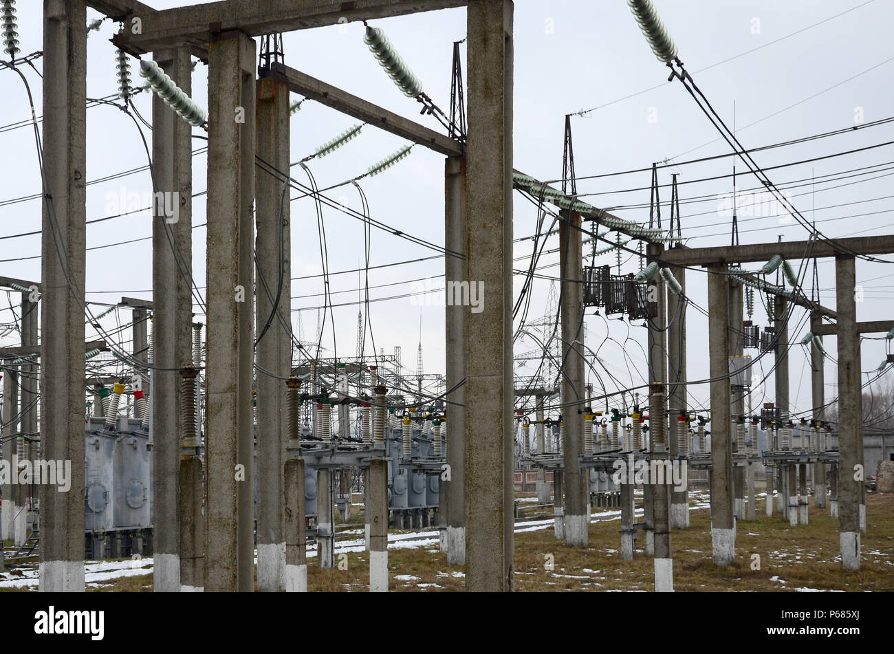 Power plant is a station of transformation. A lot of cables, poles and ...