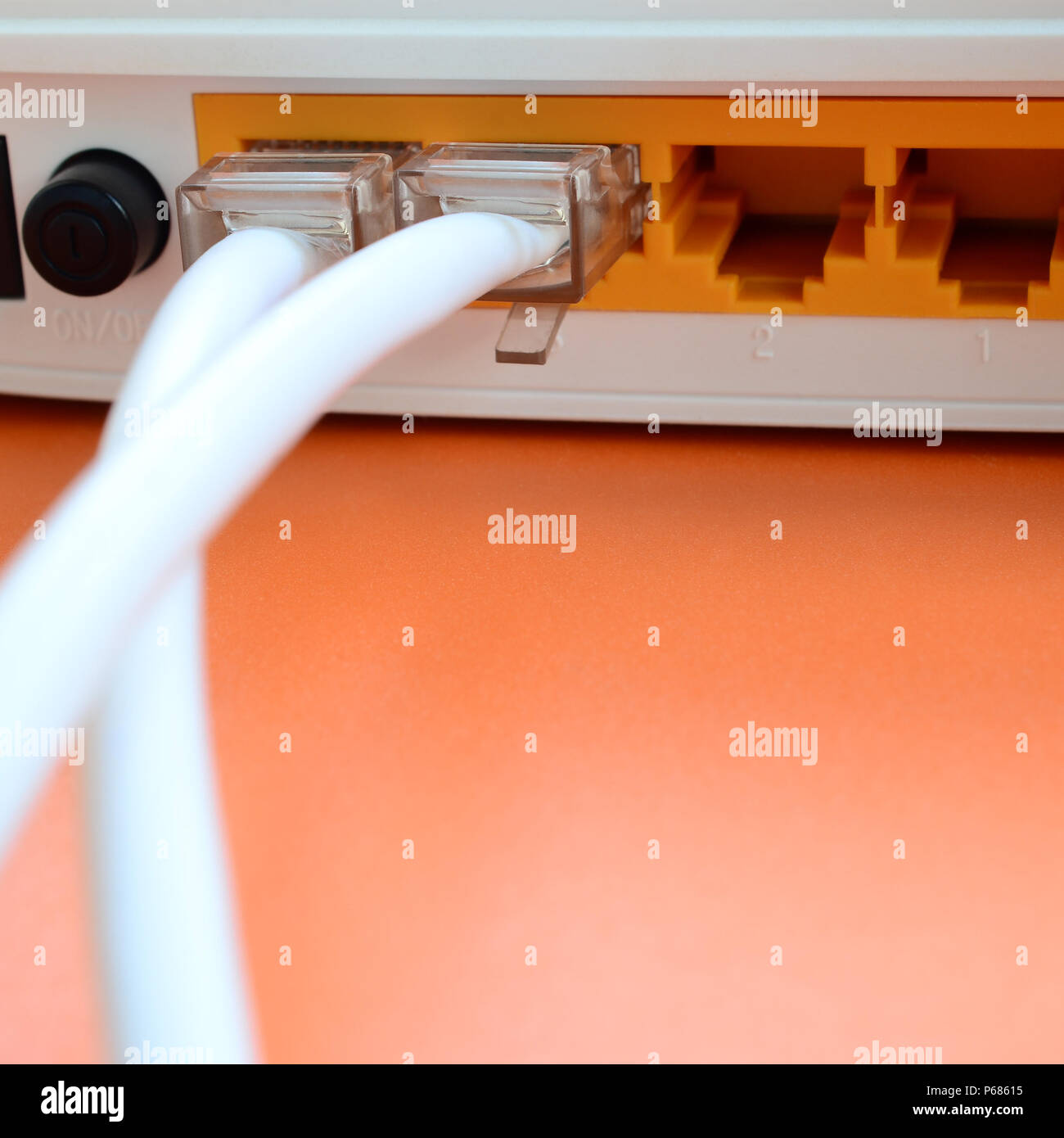 The Internet cable plugs are connected to the Internet router, which ...