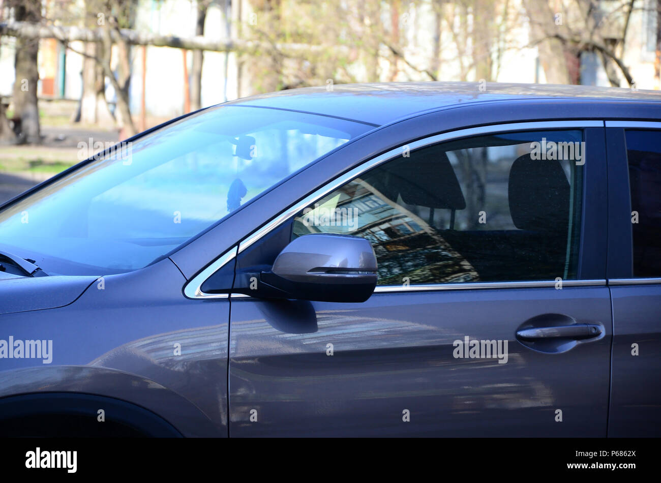 Side view glass in a dark car that stands under the open sky Stock ...