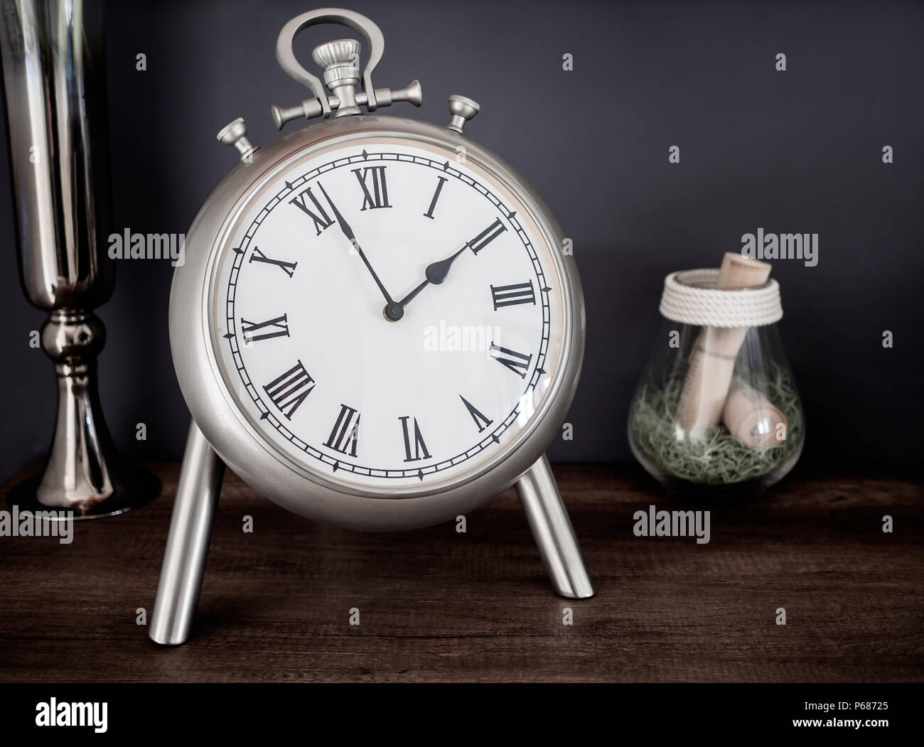 Close-up Stainless Classic Vintage Roman Numerals Clock, Glass and Vase ...