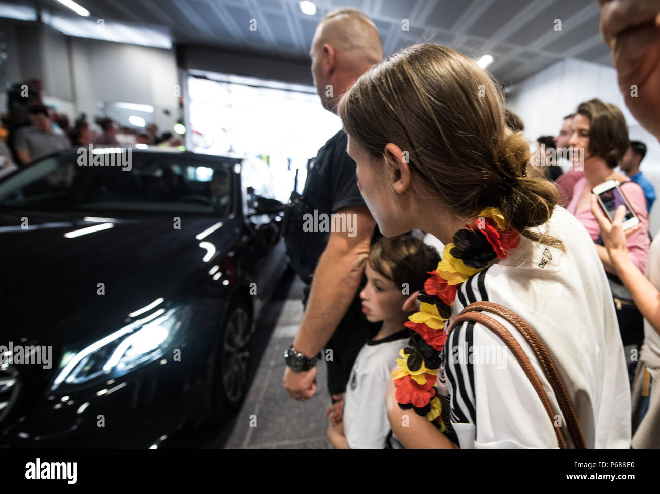 Frankfurt am Main, Germany. 28th June, 2018. A fan looking at a black ...
