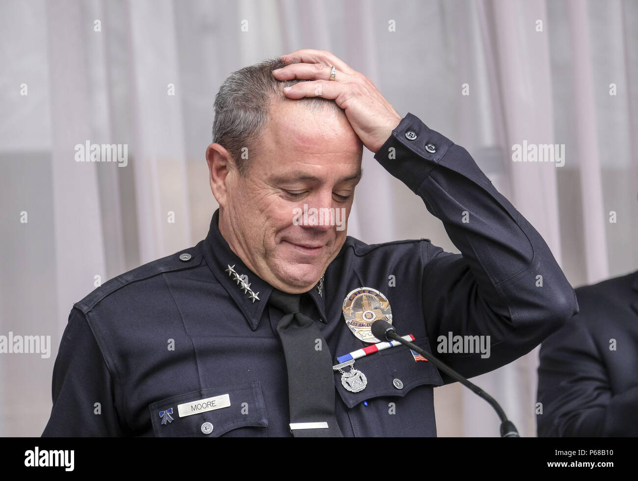 Los Angeles, California, USA. 28th June, 2018. Michel Moore addresses ...