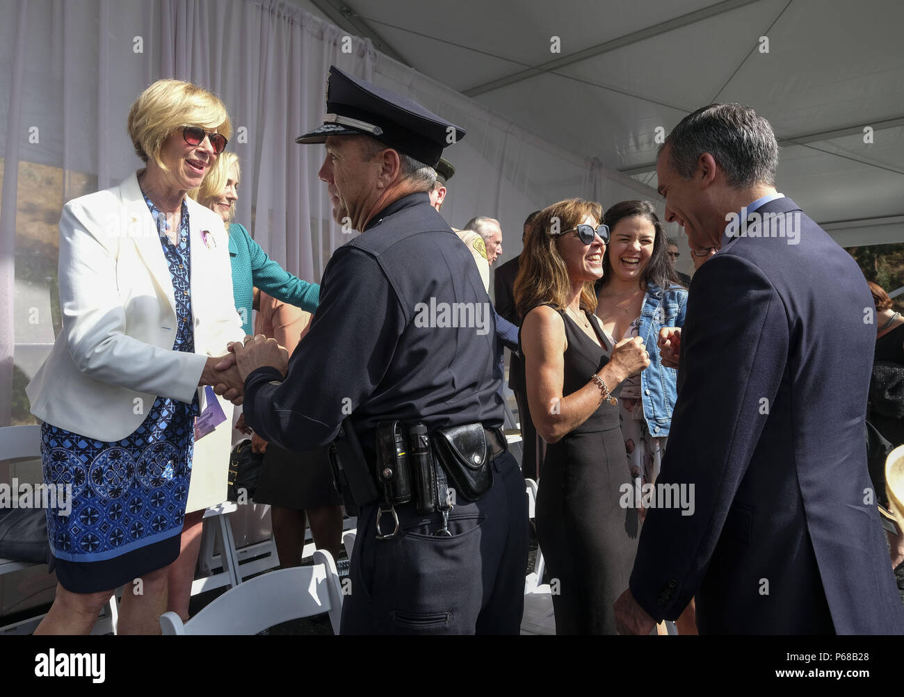 Los Angeles, California, USA. 28th June, 2018. Michel Moore greeted by ...