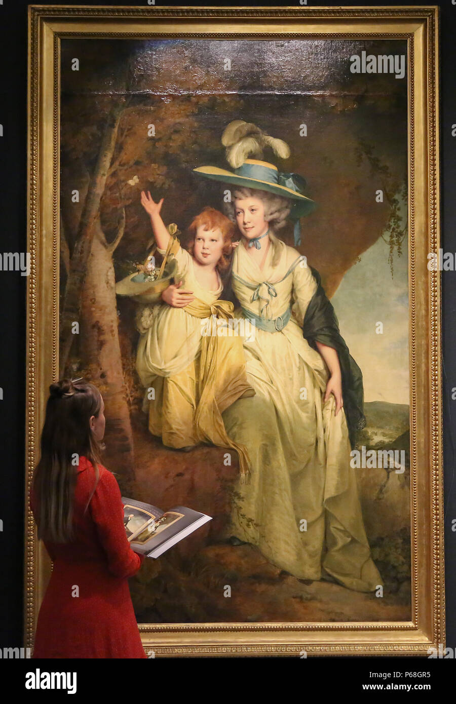 Sotheby's London. UK 29 June 2018 - A woman looks at Joseph Wright of ...