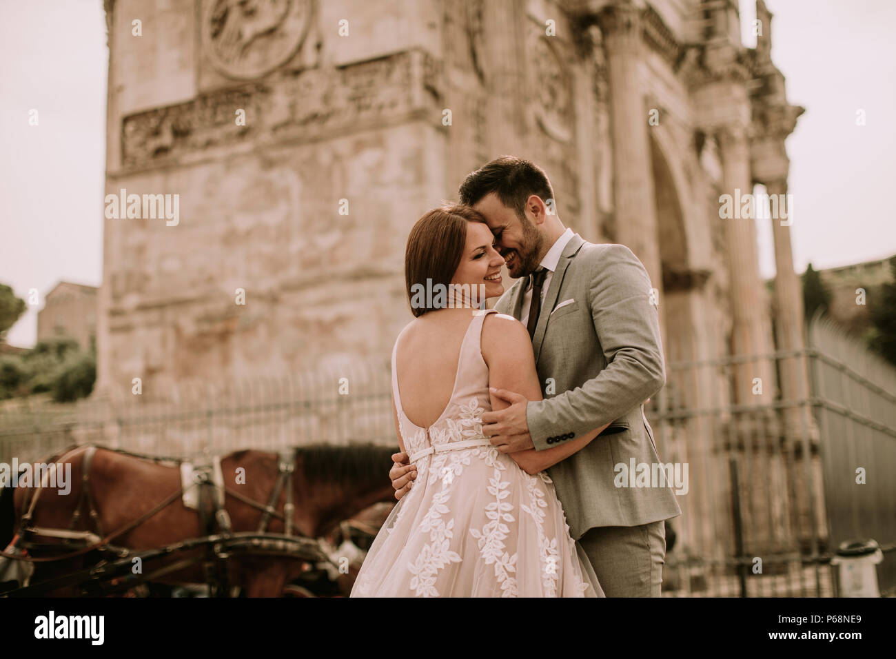 Couple holding hands in rome hi-res stock photography and images - Alamy