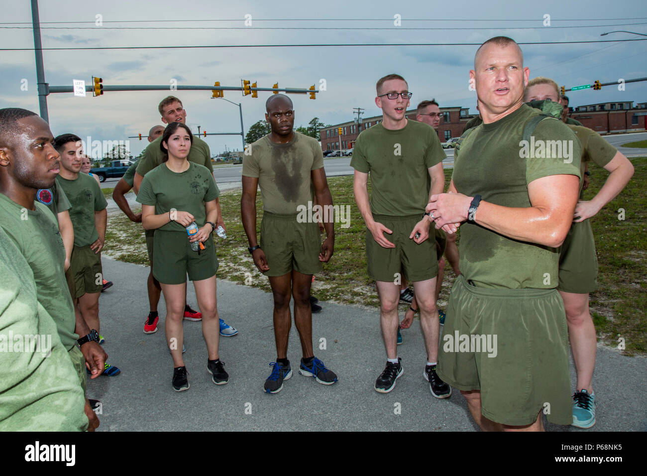 U.S. Marine Corps Gunnery Sgt. David Stankus (right), staff ...
