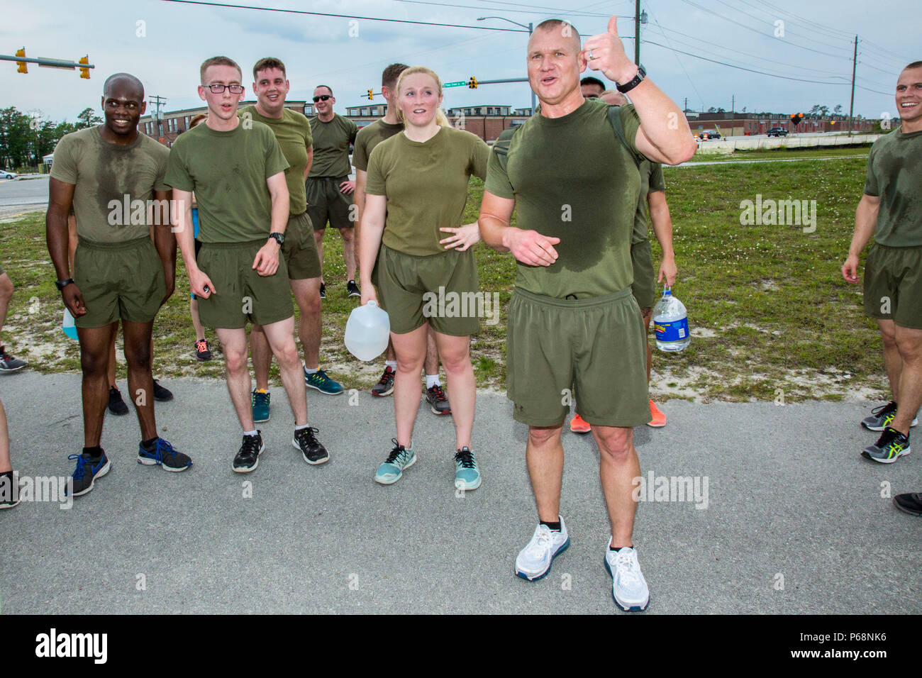 U.S. Marine Corps Gunnery Sgt. David Stankus (right), staff ...