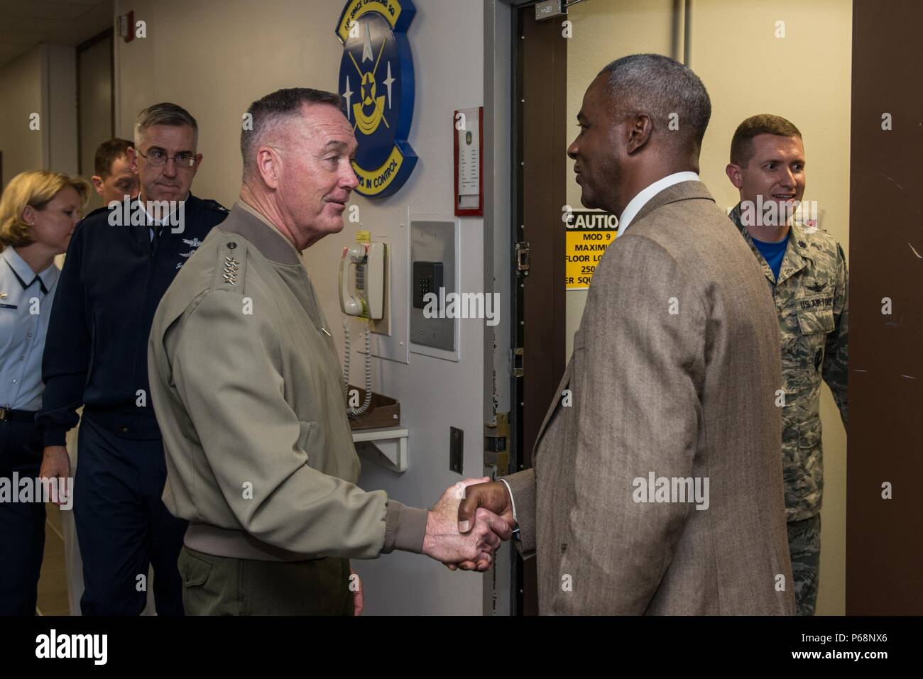 Anthony Little, 1st Space Operations Squadron, greets Gen. Joseph ...