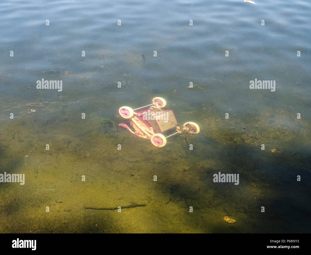 Abandoned pram hi-res stock photography and images - Alamy