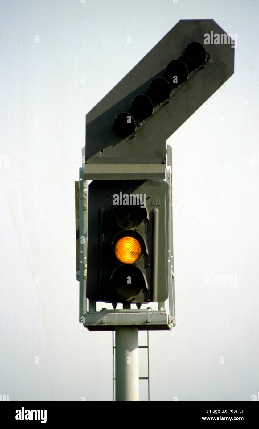 Three aspect colour signal showing yellow for caution with feather. C ...