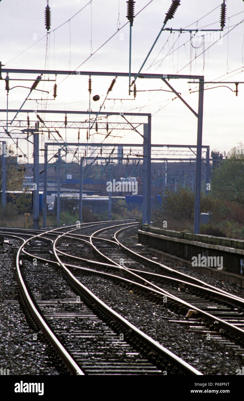 Track with overhead electric catenary. C 1999 Stock Photo - Alamy