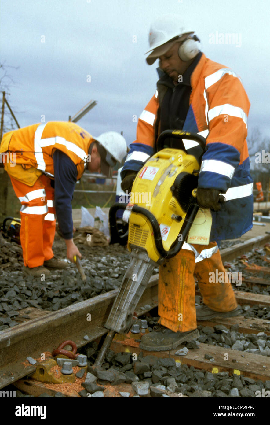 Track workers hi-res stock photography and images - Alamy