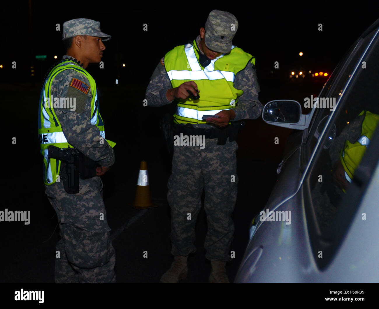 U.S. Army Sgt. Ziggy Tubalado and Spc. Fernando Martinez of the 330th ...