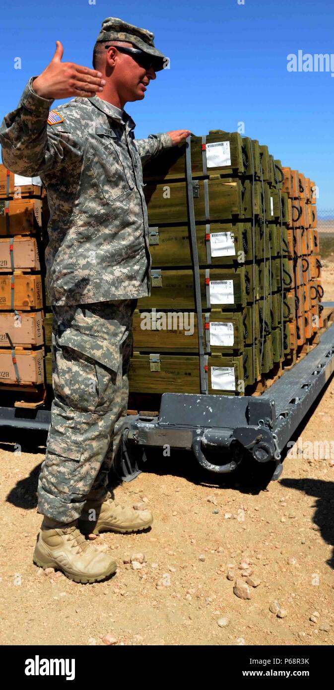 U.S. Army Sgt. 1st Class Jonathan Judy explains the procedure for ...