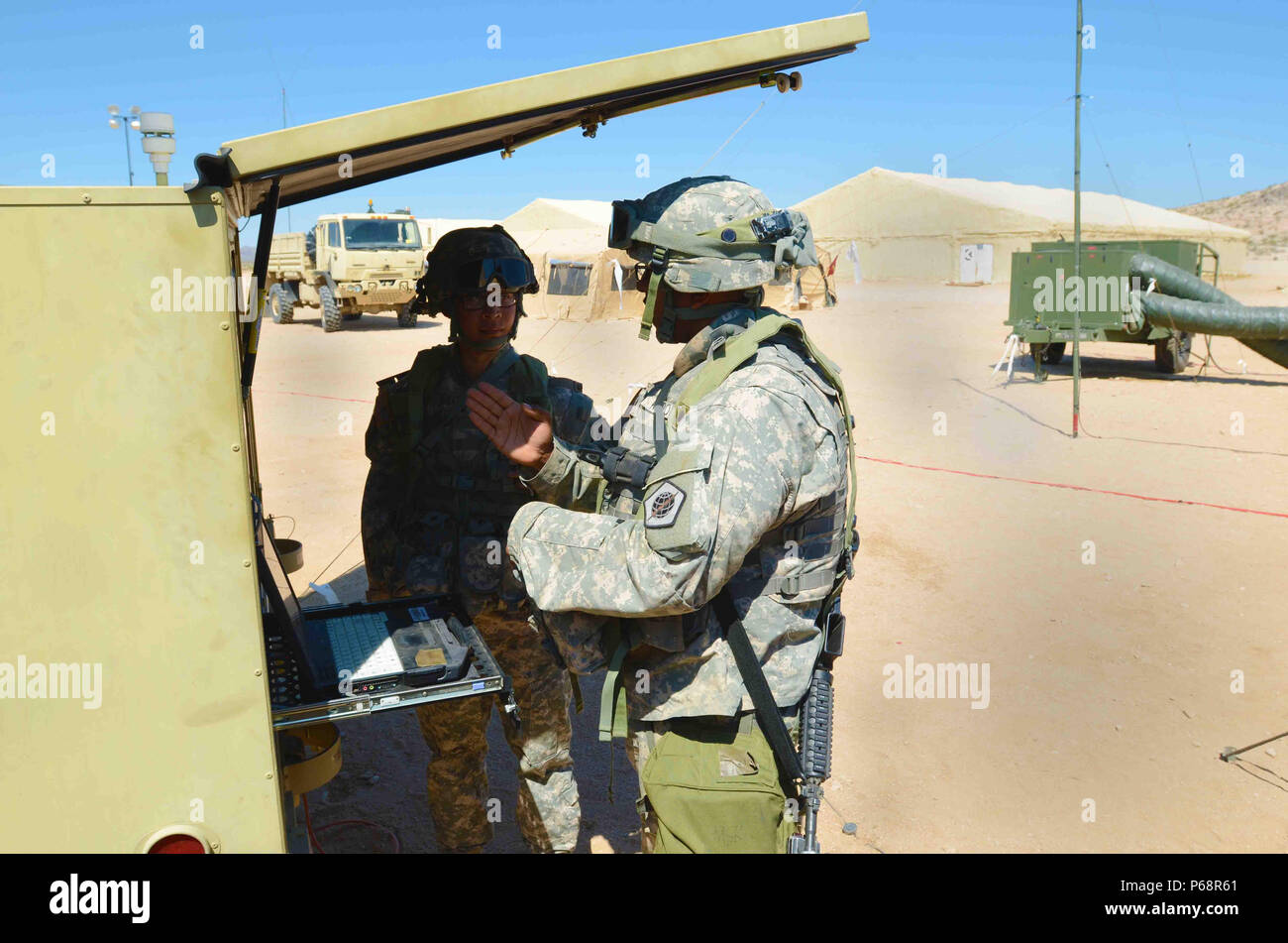 U.S. Army 1st Lt. Dat Dang and Sgt. Maurice Wendorf of the 98th ...