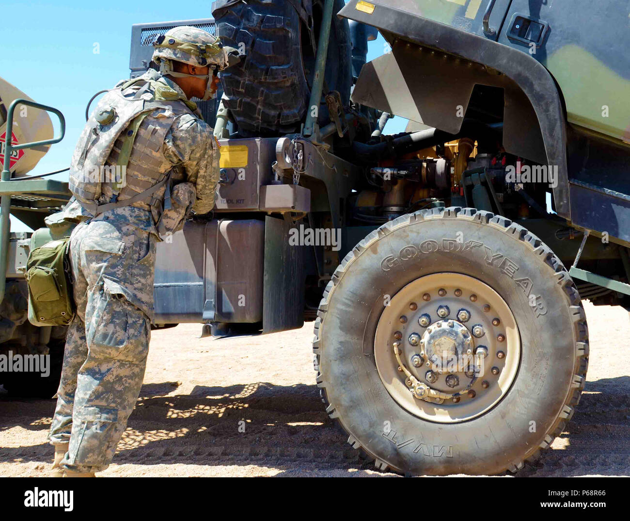 U.S. Army Pfc. Narkim Scott of the 325th Transportation Company lifts ...
