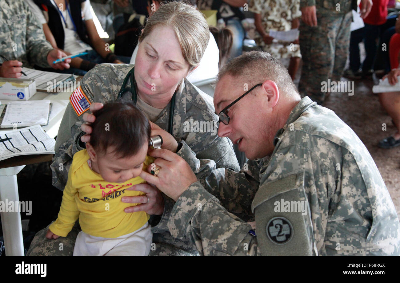 U.S. Army Maj. Tim Dicarlo and Capt. Margaret Bueneman, with the 396th ...