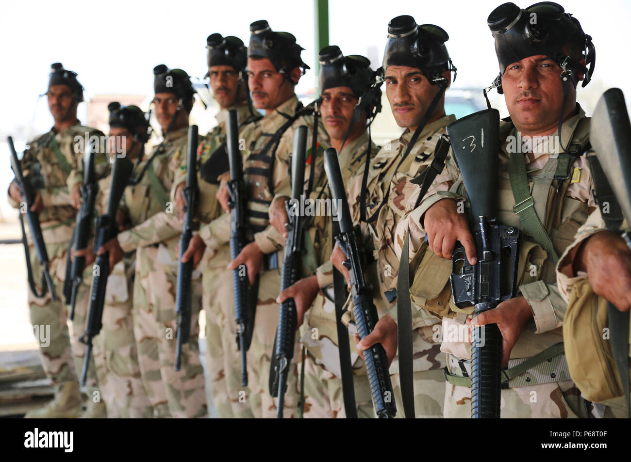 Iraqi soldiers, assigned to 3rd Battalion, 36th Brigade, 9th Mechanized ...