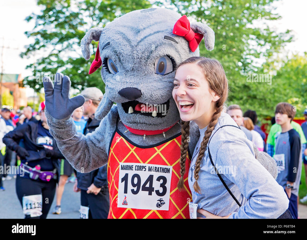 Runner Molly Murray poses with Molly the Marine Corps Marathon bulldog ...